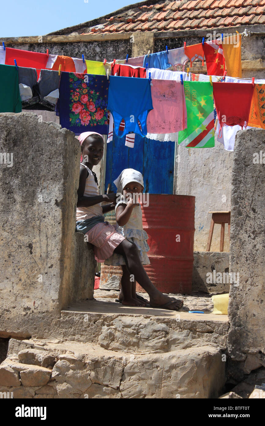 Colorful washing line with Cape Verdian children Stock Photo - Alamy