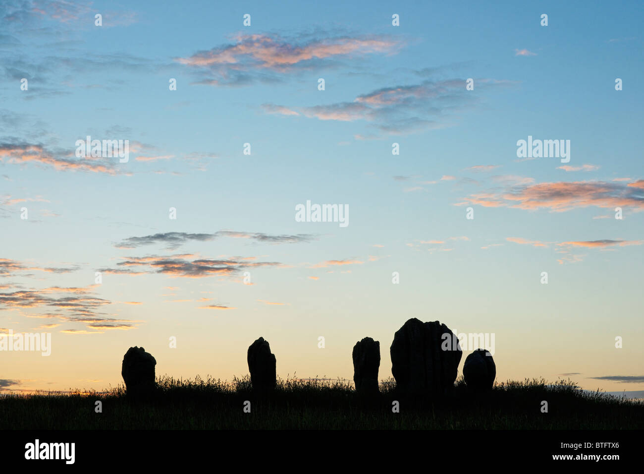 Duddo Stone Circle, Northumberland, England, UK. At sunset. Also known ...