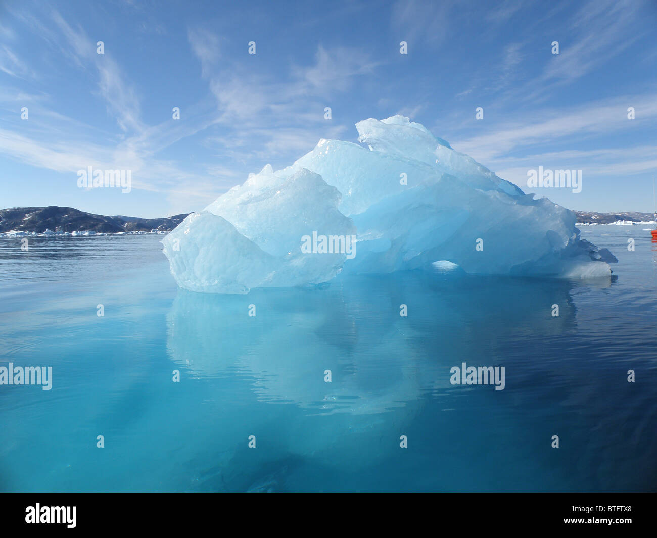 Iceberg with reflection Stock Photo - Alamy