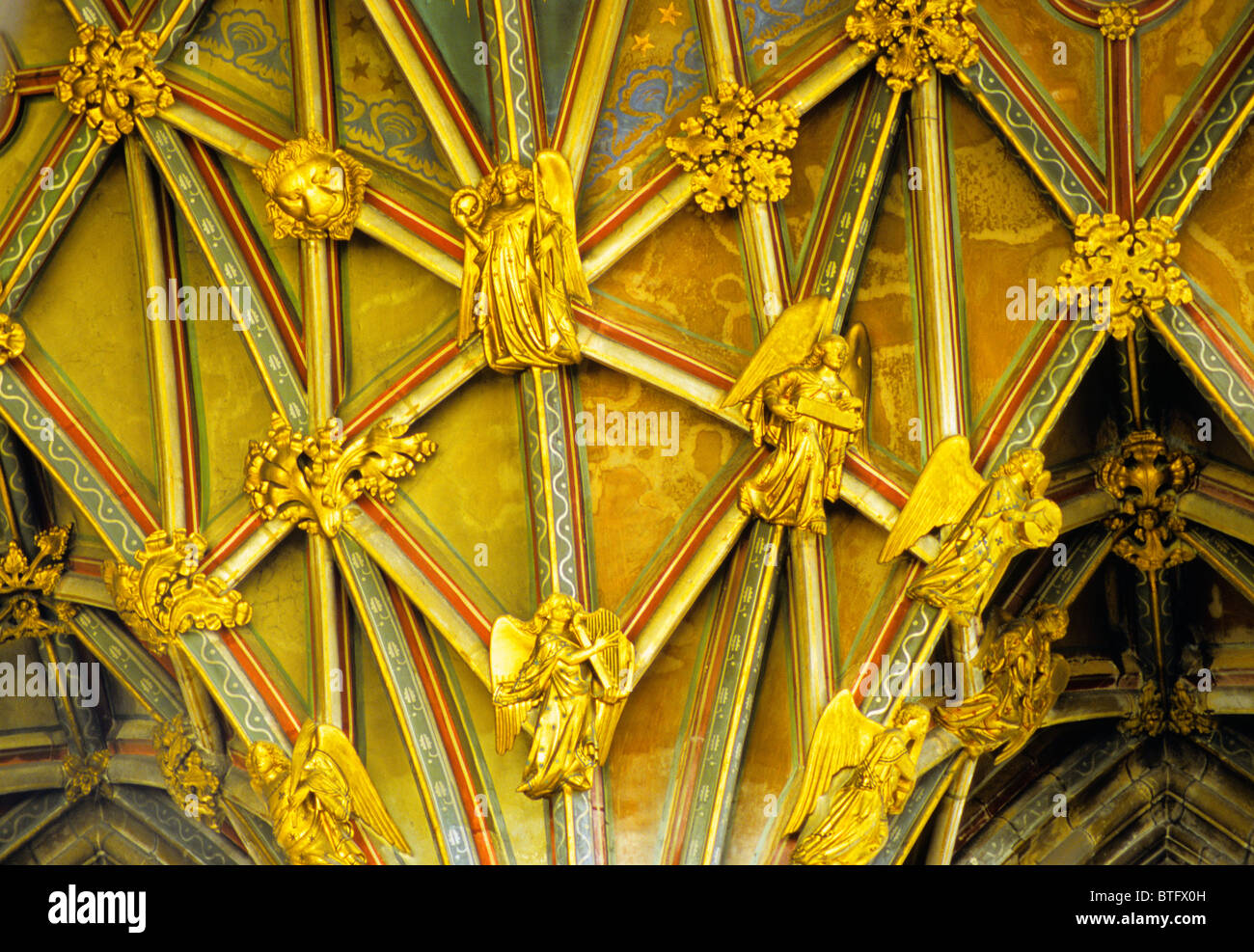 Ceiling decorated with angelic musicians above the choir of Gloucester ...