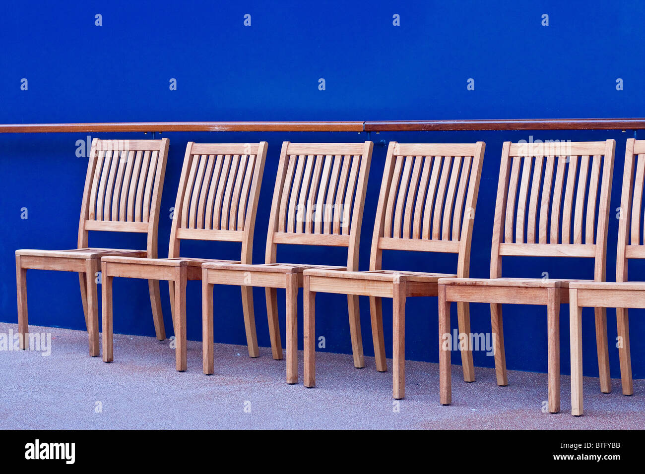 Chairs on a wall hi-res stock photography and images - Alamy