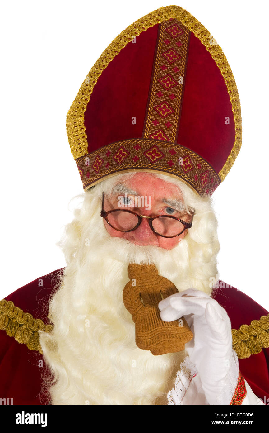 Portrait of Dutch Sinterklaas with traditional cookie Stock Photo - Alamy