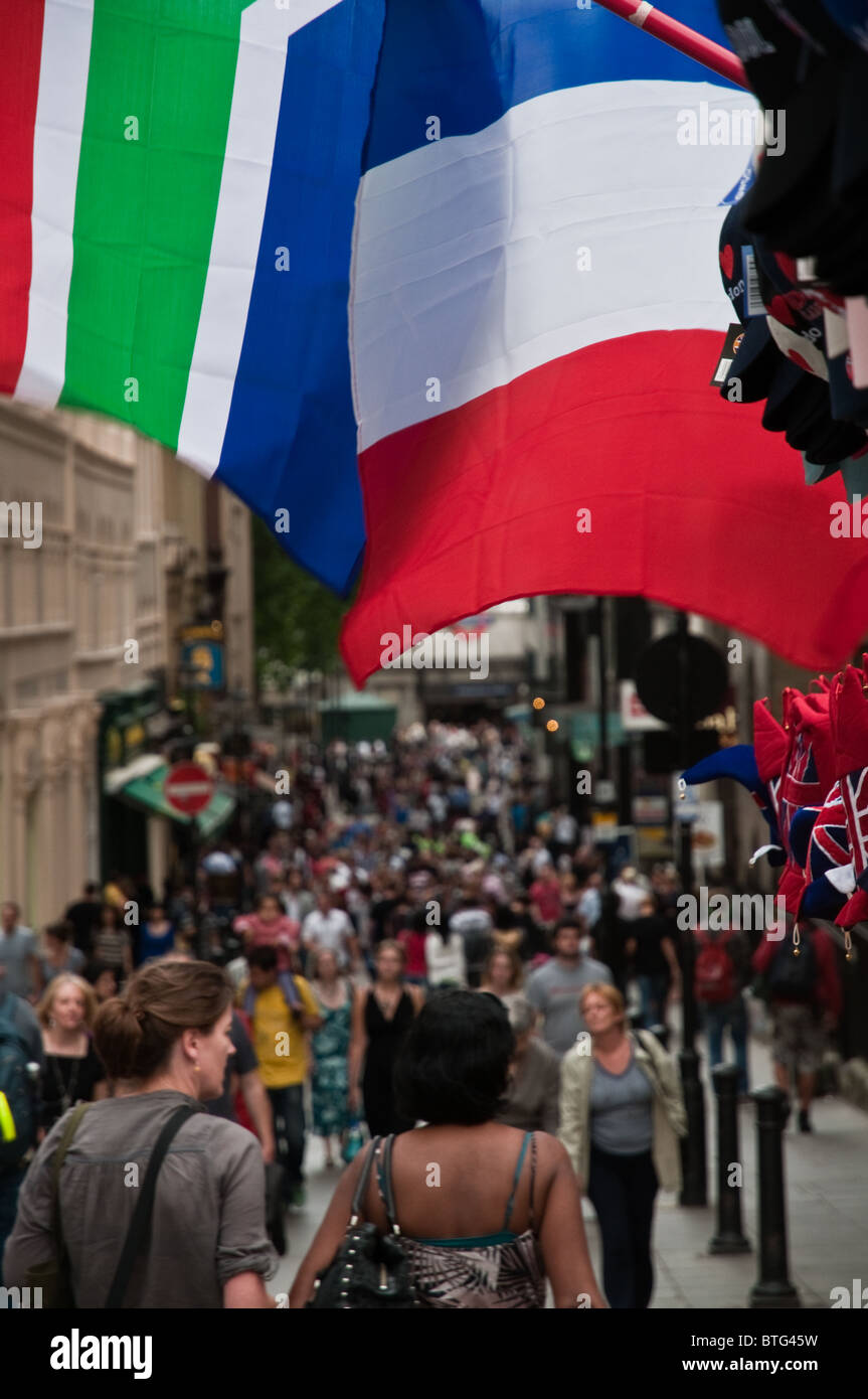 Colourful flags on a crowded London street Stock Photo - Alamy