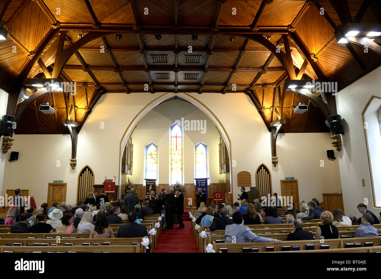 The inside of a North Wales Church. A wedding is taking place in the ...