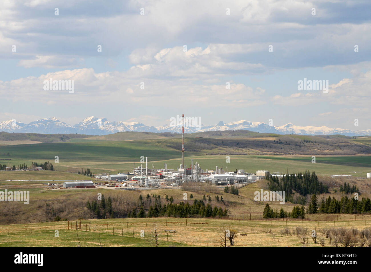 Gas processing plant in the foothills of the Canadian Rocky Mountains ...