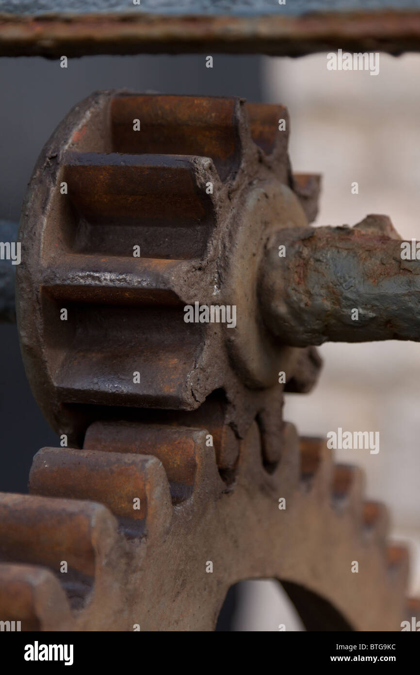 Rusty cogs on seafaring equipment at Kimmeridge Bay, Dorset Stock Photo ...
