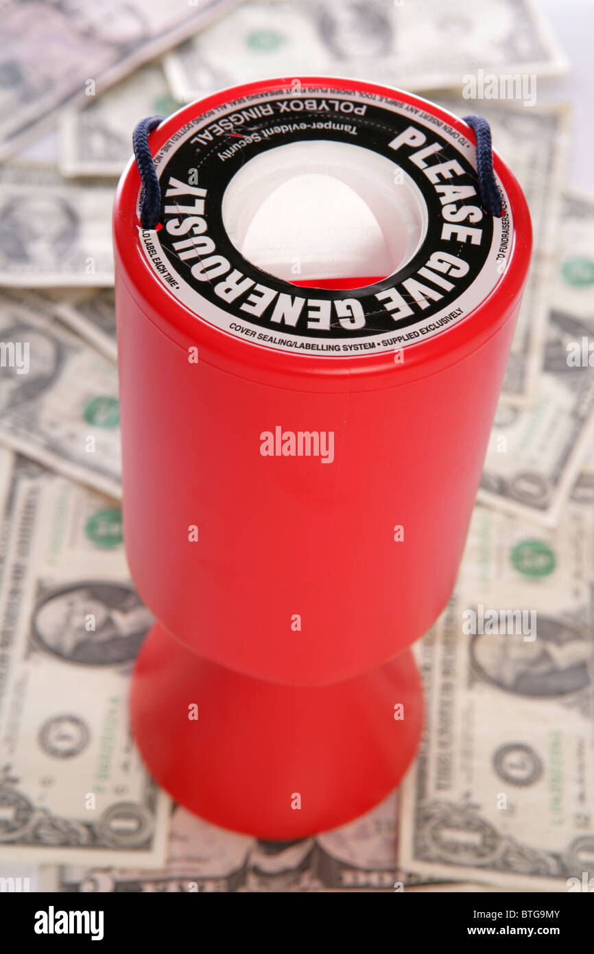 Red charity collection with american dollars Stock Photo - Alamy