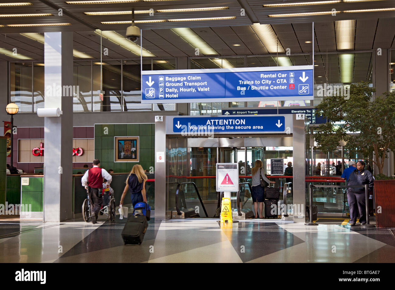 Exit of the secure area of Chicago O'Hare Airport, Illinois, USA Stock ...