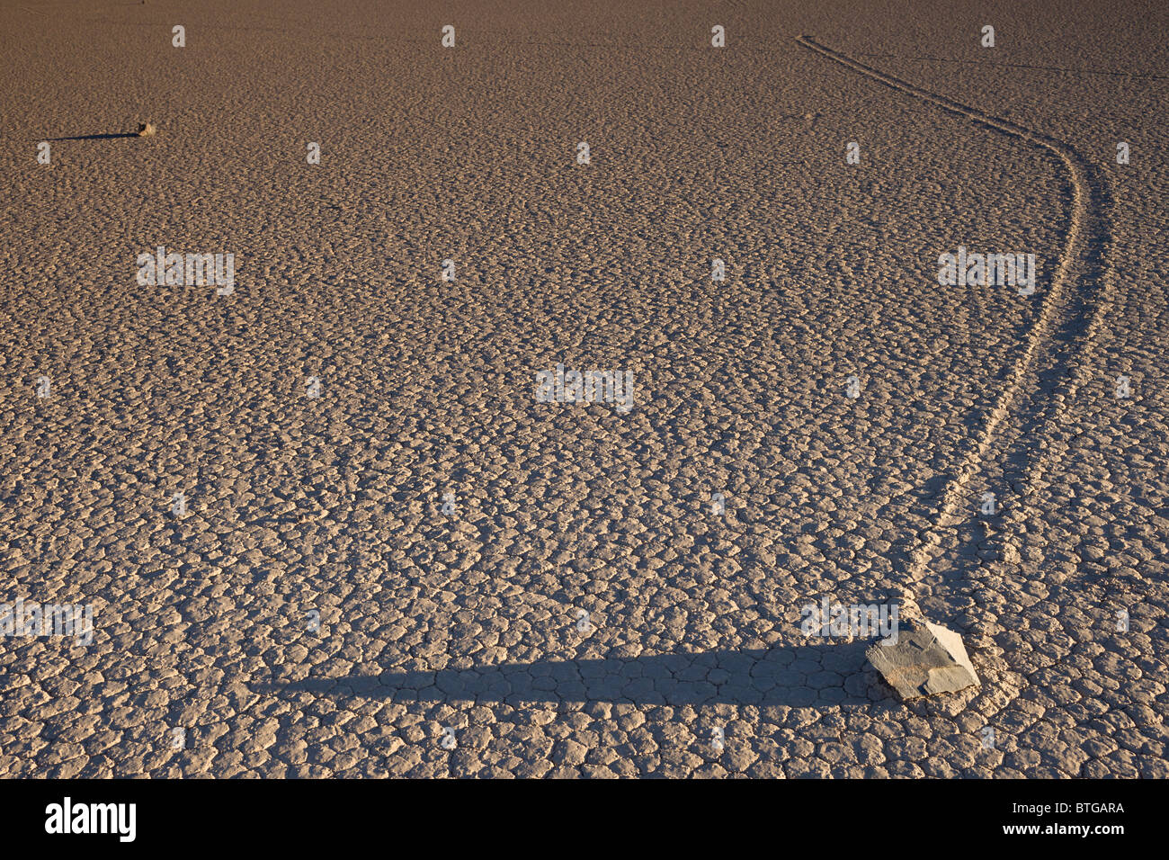 Sailing stones or sliding rocks at The Racetrack Playa in Death Valley ...