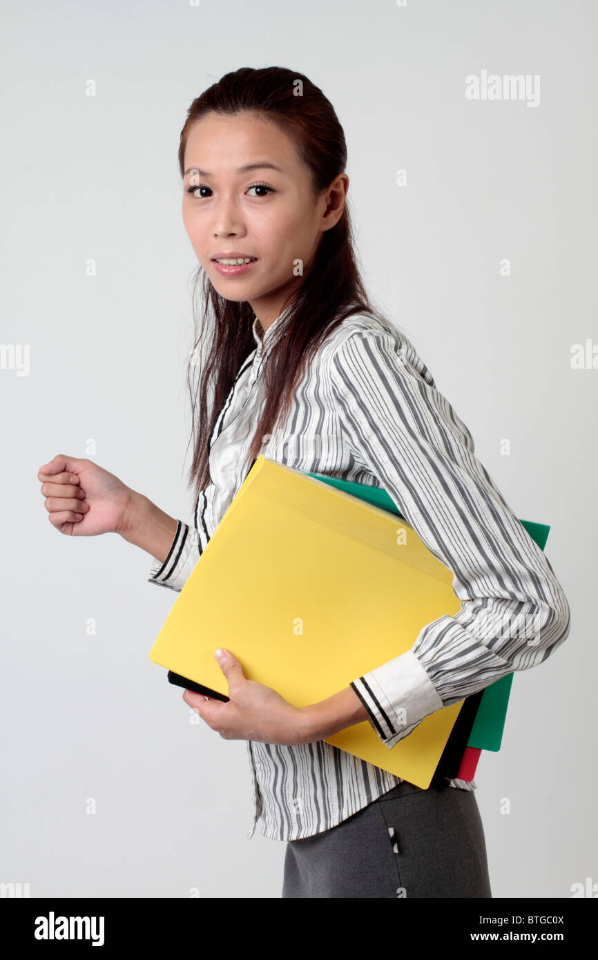 Office lady with files Stock Photo - Alamy