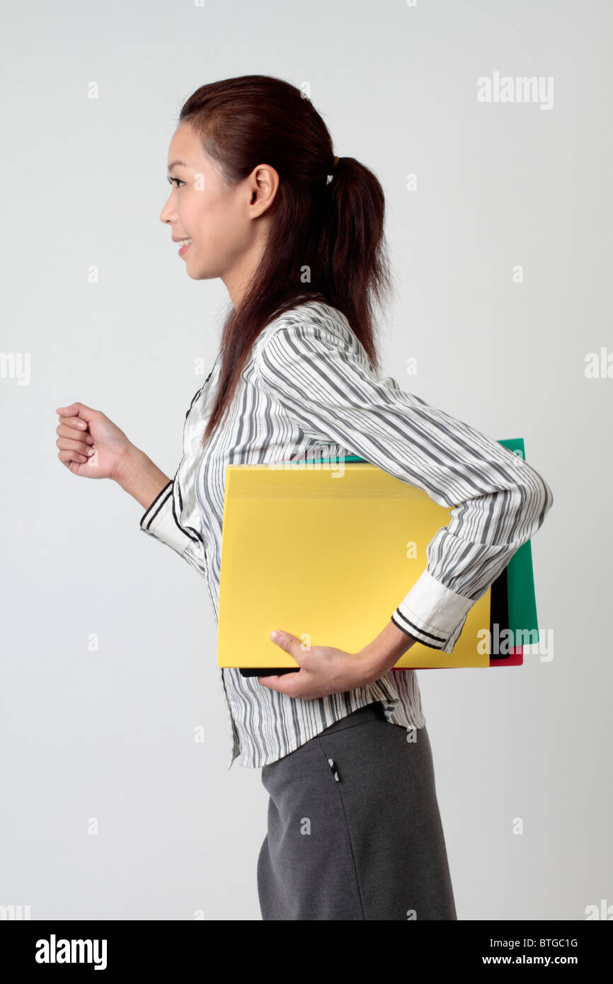 Office lady with files Stock Photo - Alamy
