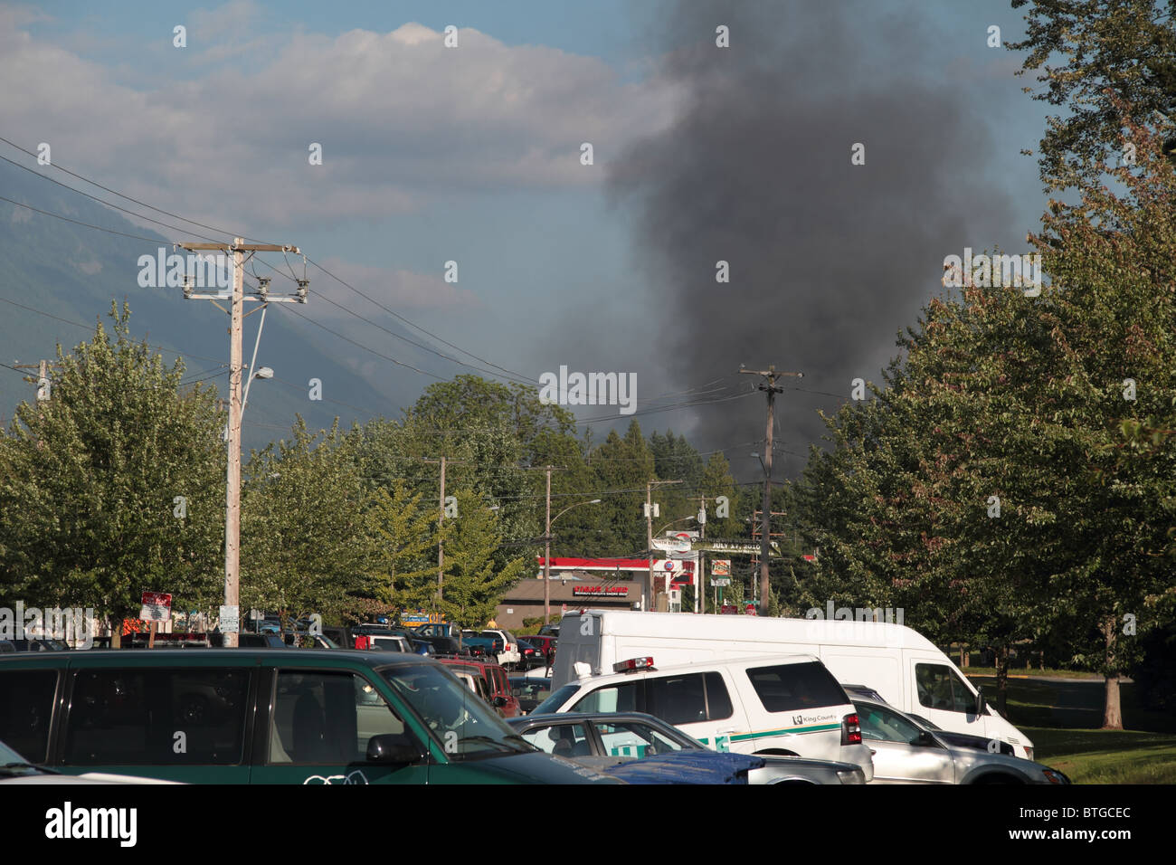 Distant dark smoke from a structure fire that just started taken just ...