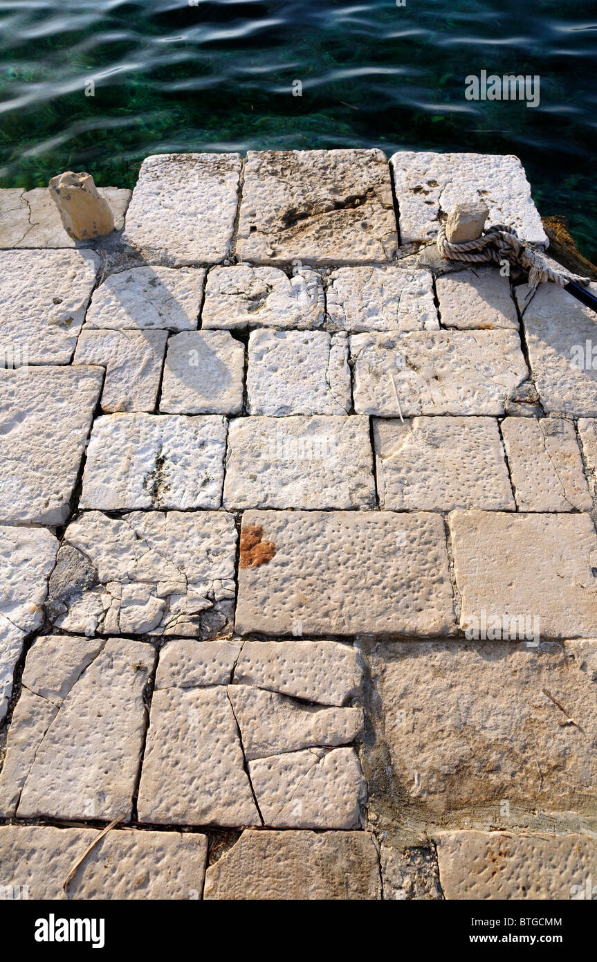 Detail of small stone wharf, Silba Island, Croatia Stock Photo - Alamy