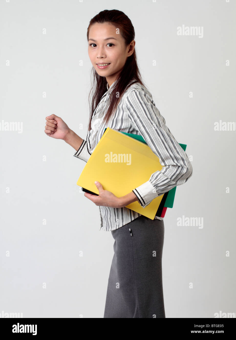 Office lady with files Stock Photo - Alamy