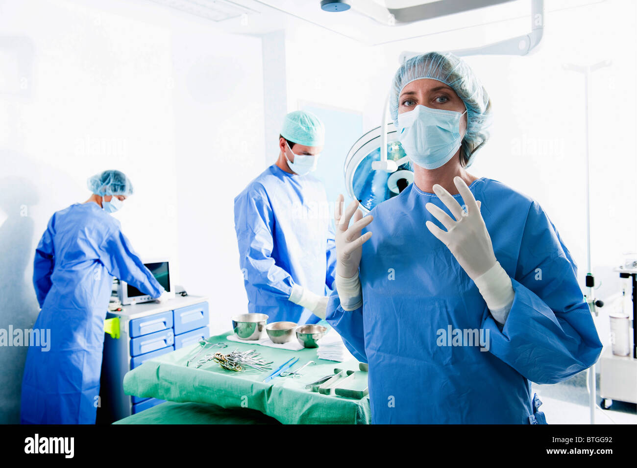 Medical personnel in operating room Stock Photo - Alamy