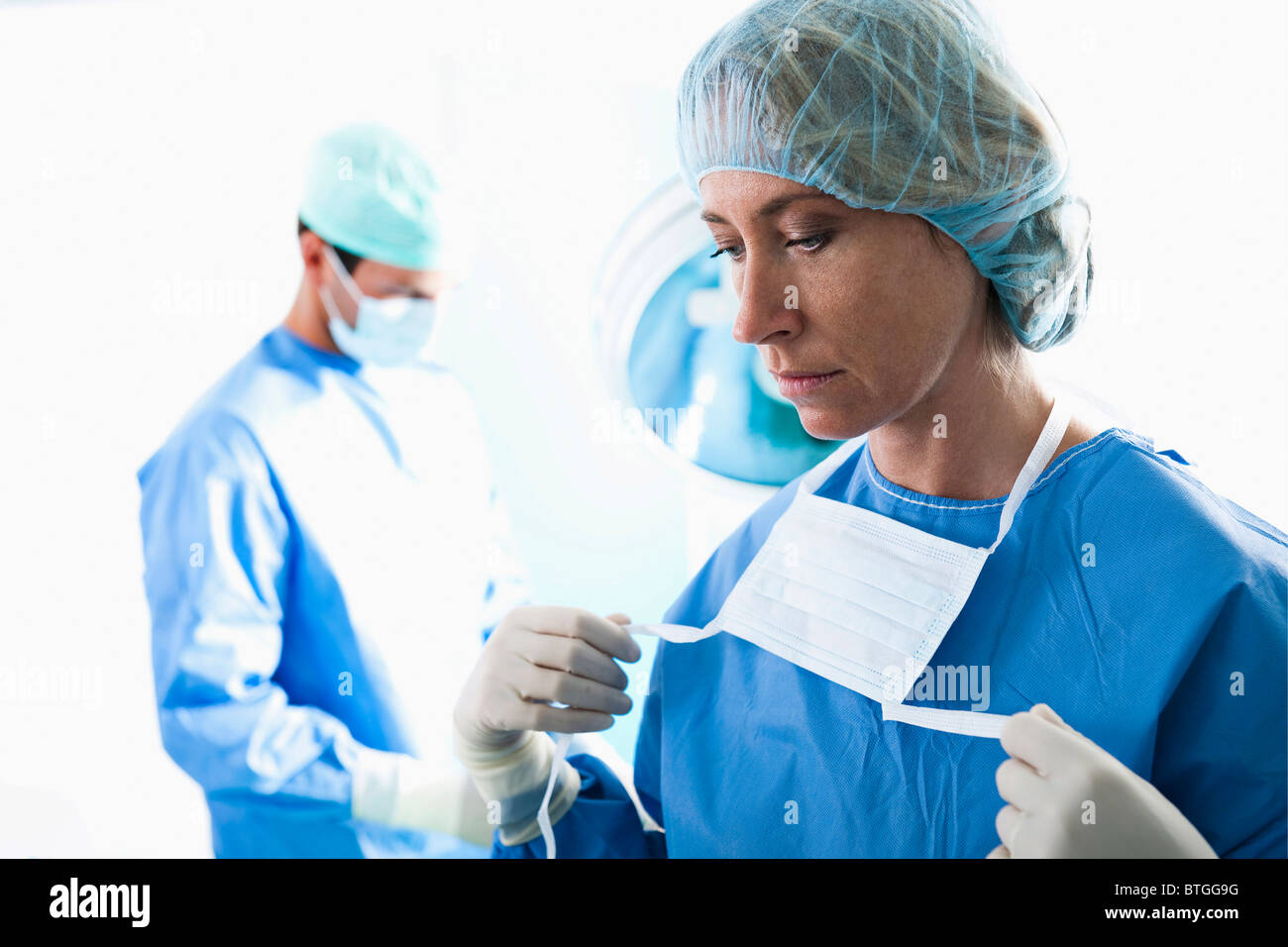 Medical personnel in operating room Stock Photo - Alamy