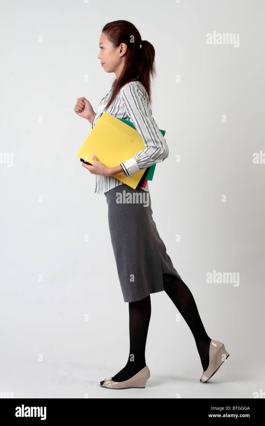 Office lady with files Stock Photo - Alamy