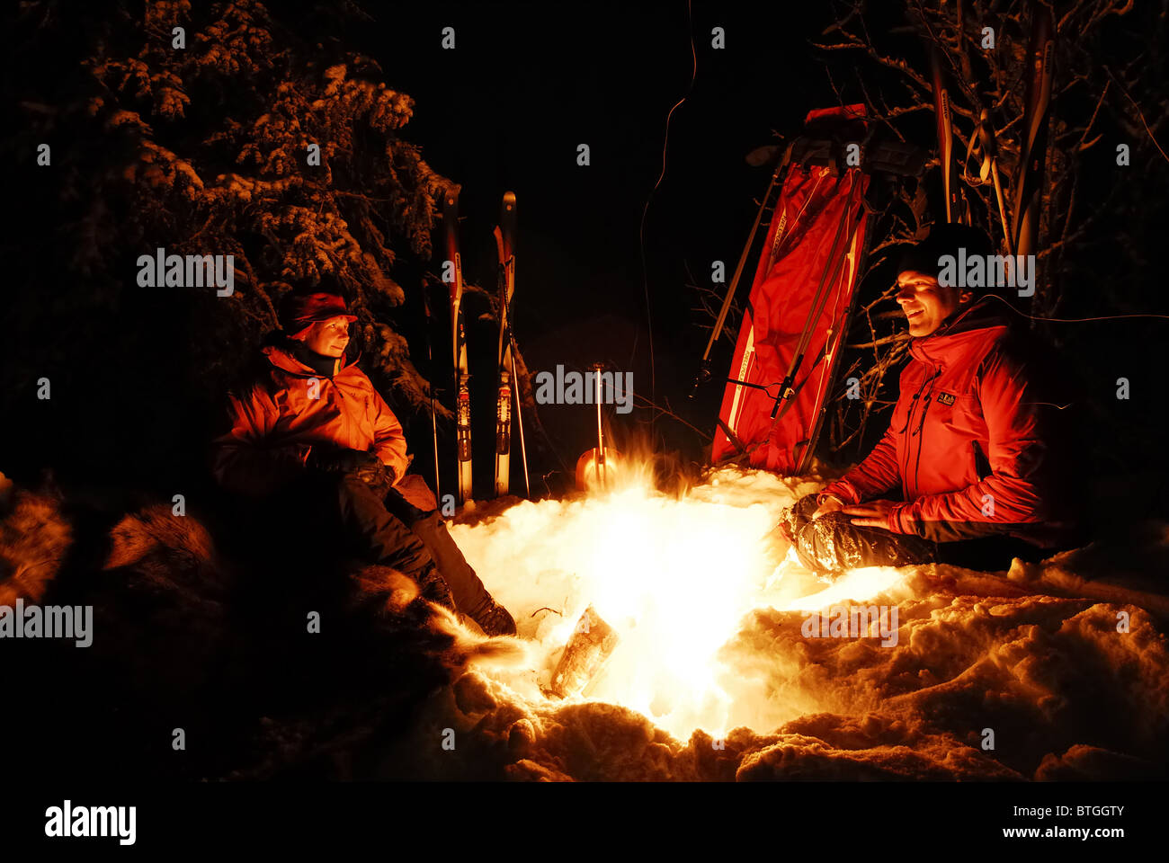 Resting at campfire Stock Photo - Alamy