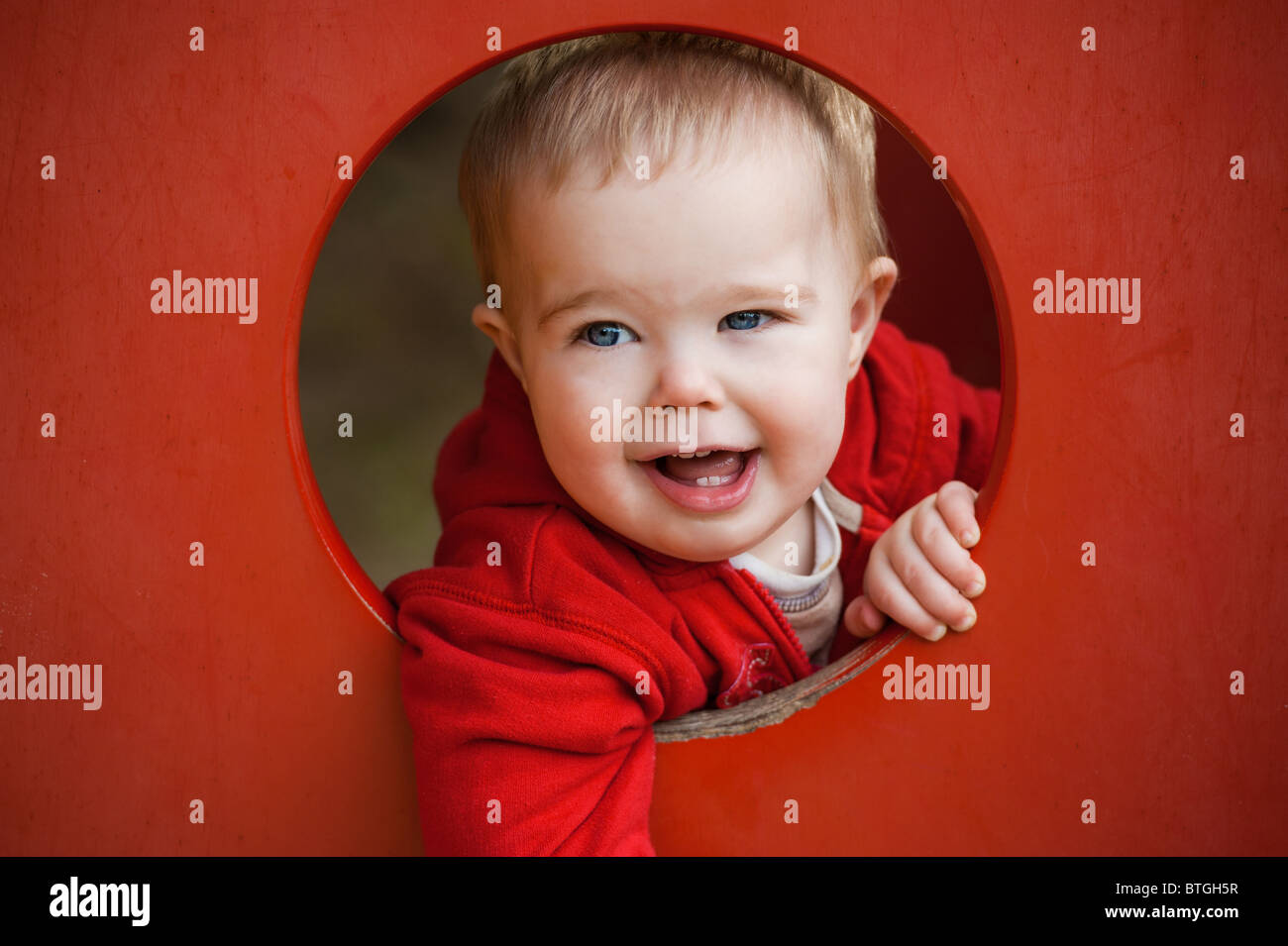 Happy toddler boy playing Stock Photo - Alamy