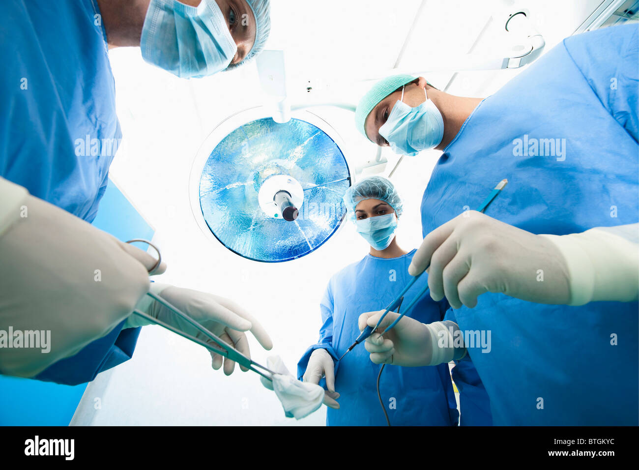Medical personnel in operating room Stock Photo - Alamy