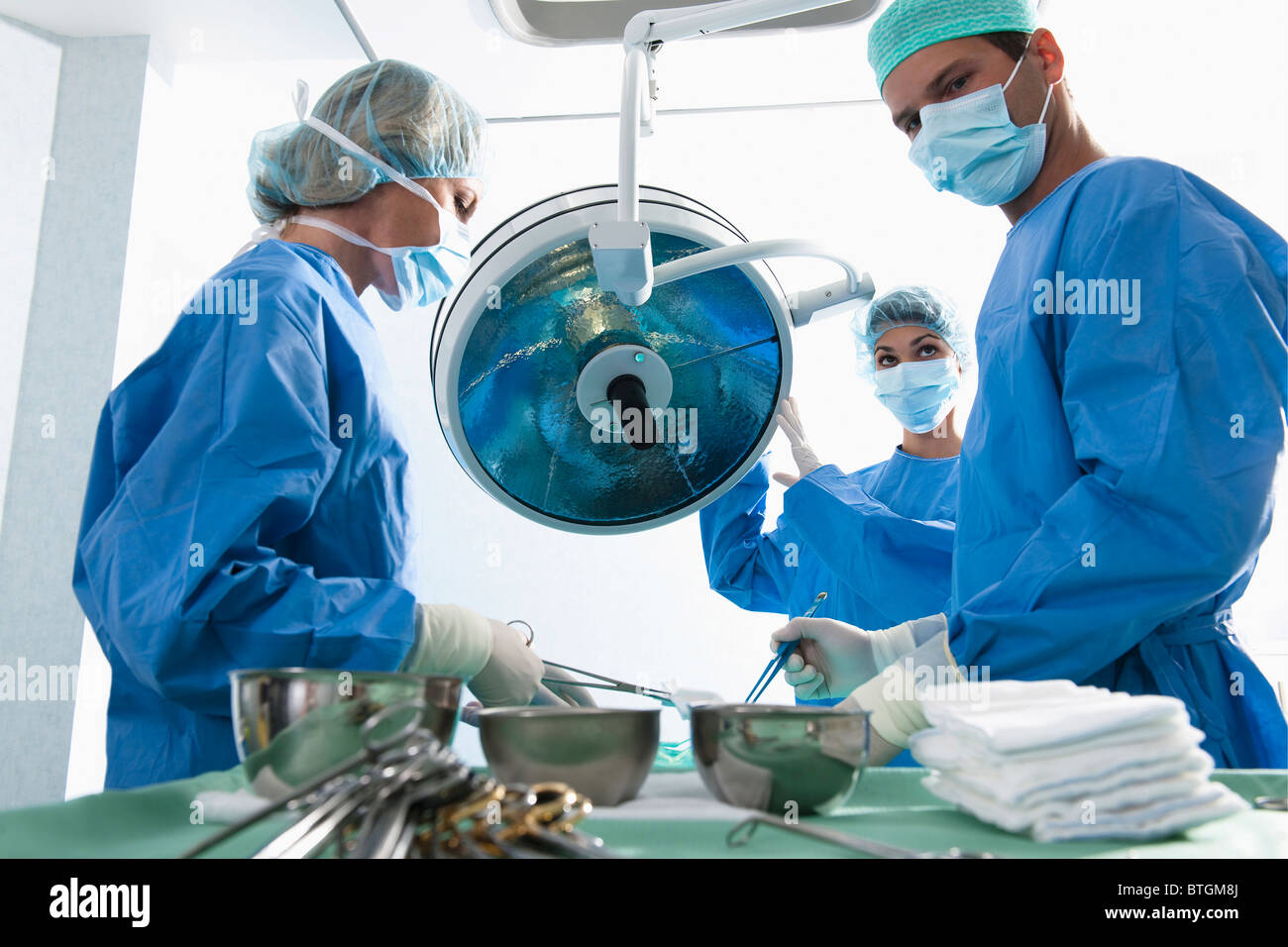 Medical personnel in operating room Stock Photo - Alamy