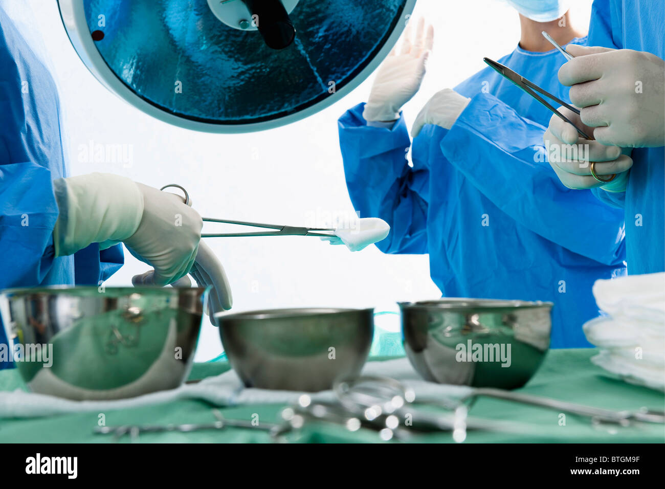 Medical personnel in operating room Stock Photo - Alamy