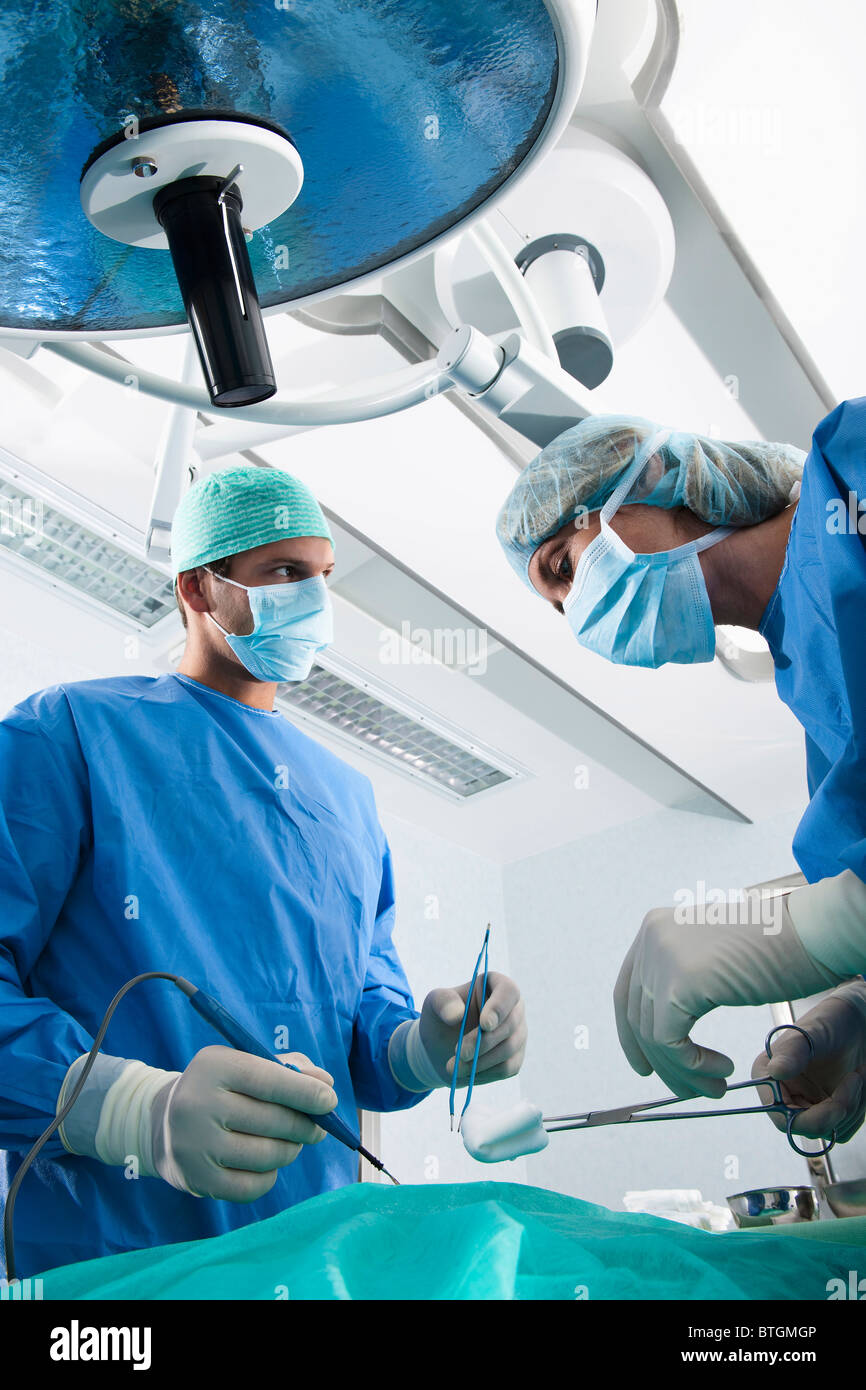 Medical personnel in operating room Stock Photo - Alamy