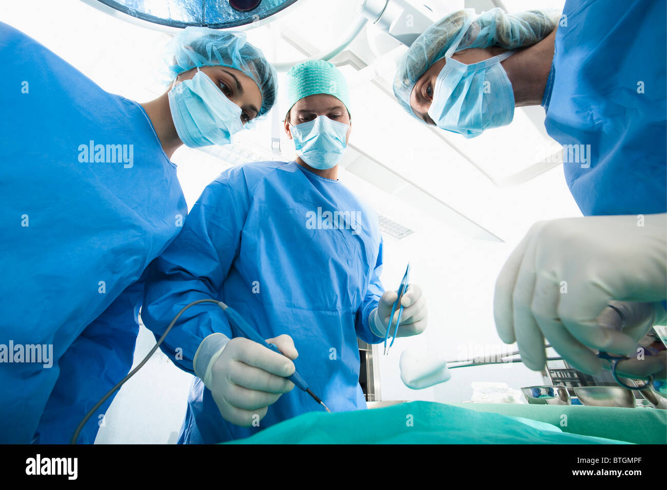 Medical personnel in operating room Stock Photo - Alamy