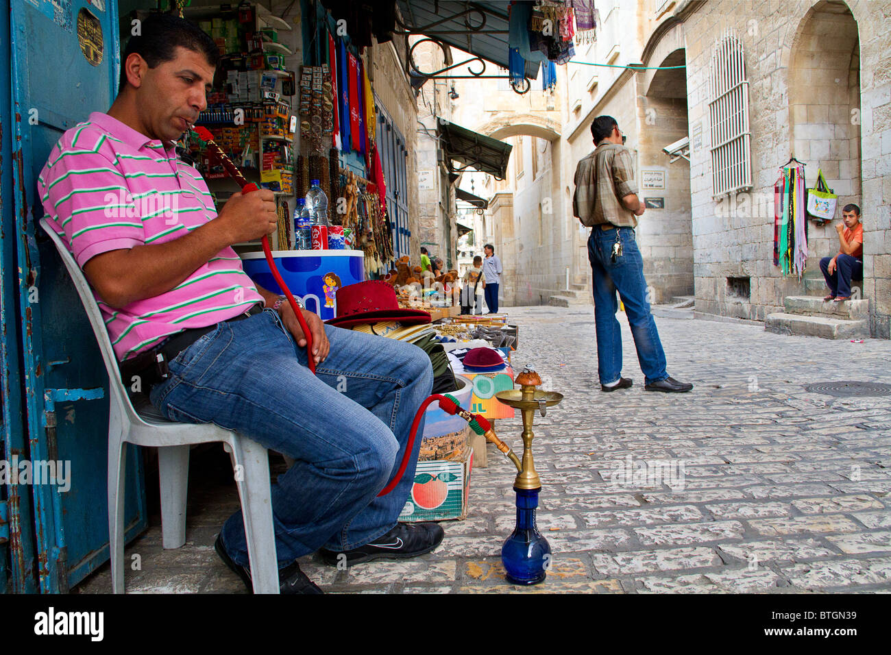An Arab resident smoking Shisha-pipe in the old city East Jerusalem ...