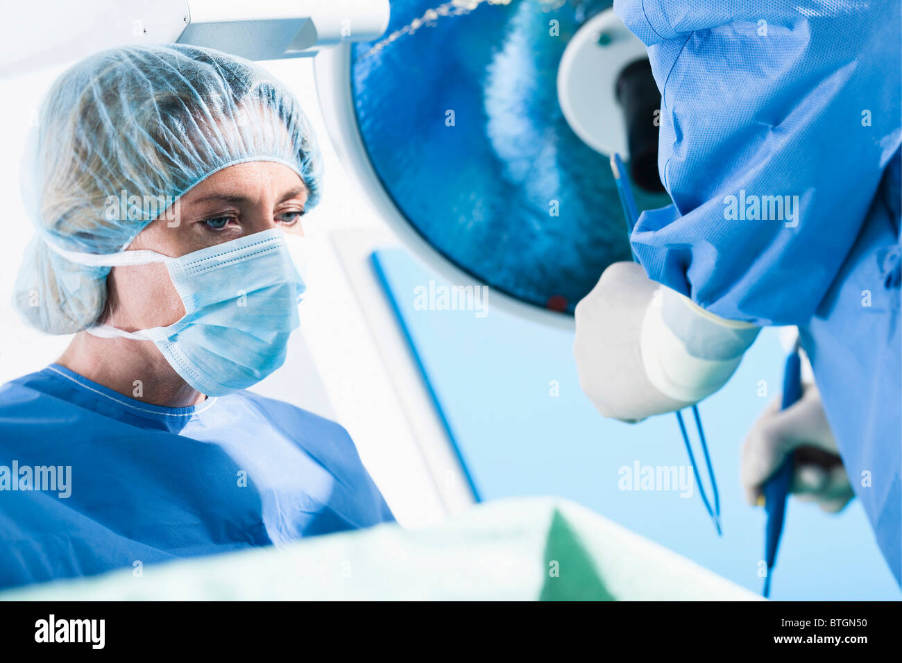 Medical personnel in operating room Stock Photo - Alamy