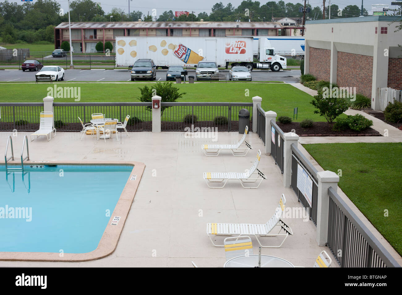 Motel swimming pool in carpark, Georgia, USA Stock Photo - Alamy