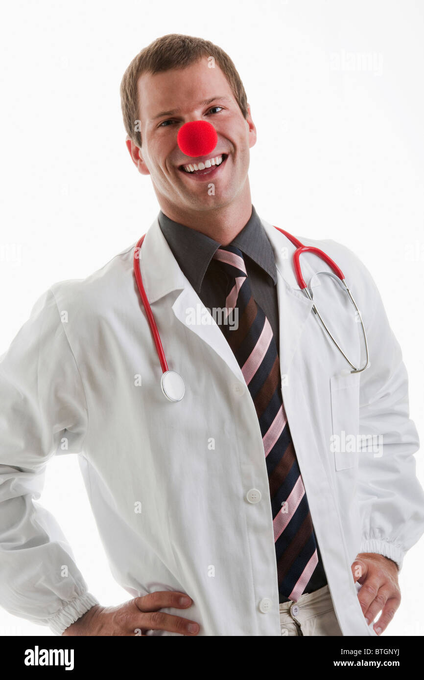 Doctor with stethoscope and clown's nose Stock Photo - Alamy