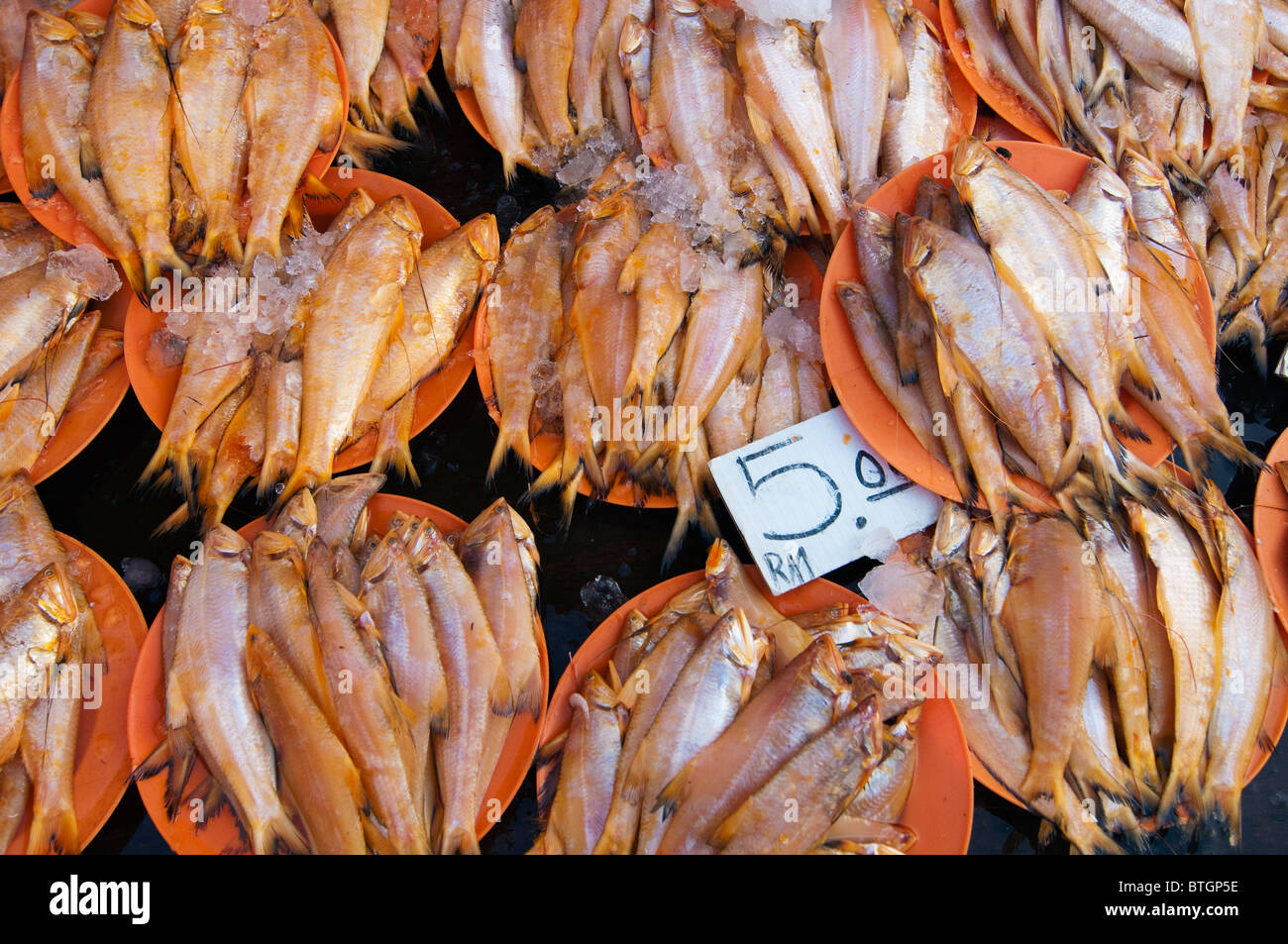 Little orange fish for sale in the Weekend Market on Jalan Satok Stock ...