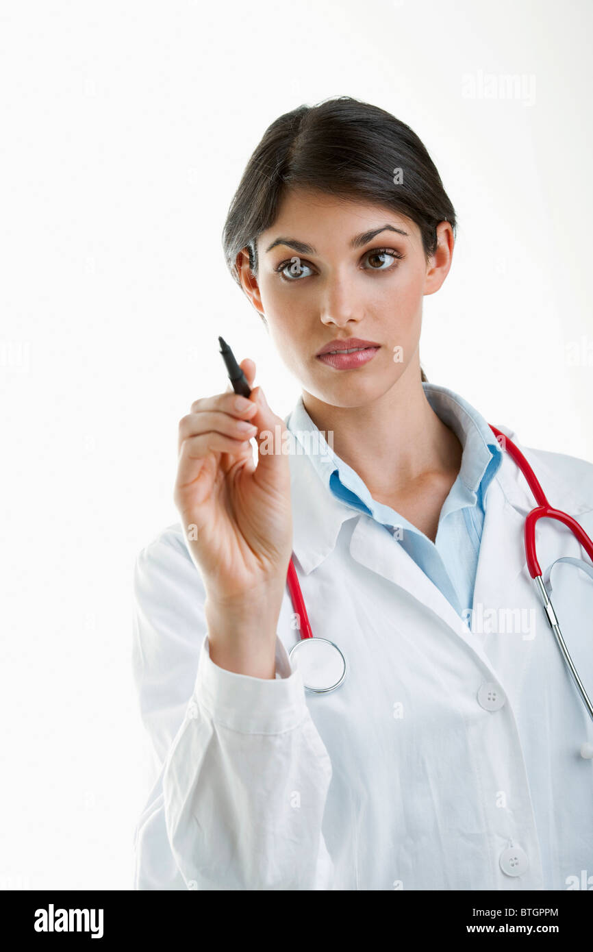 Doctor writing with pen Stock Photo - Alamy