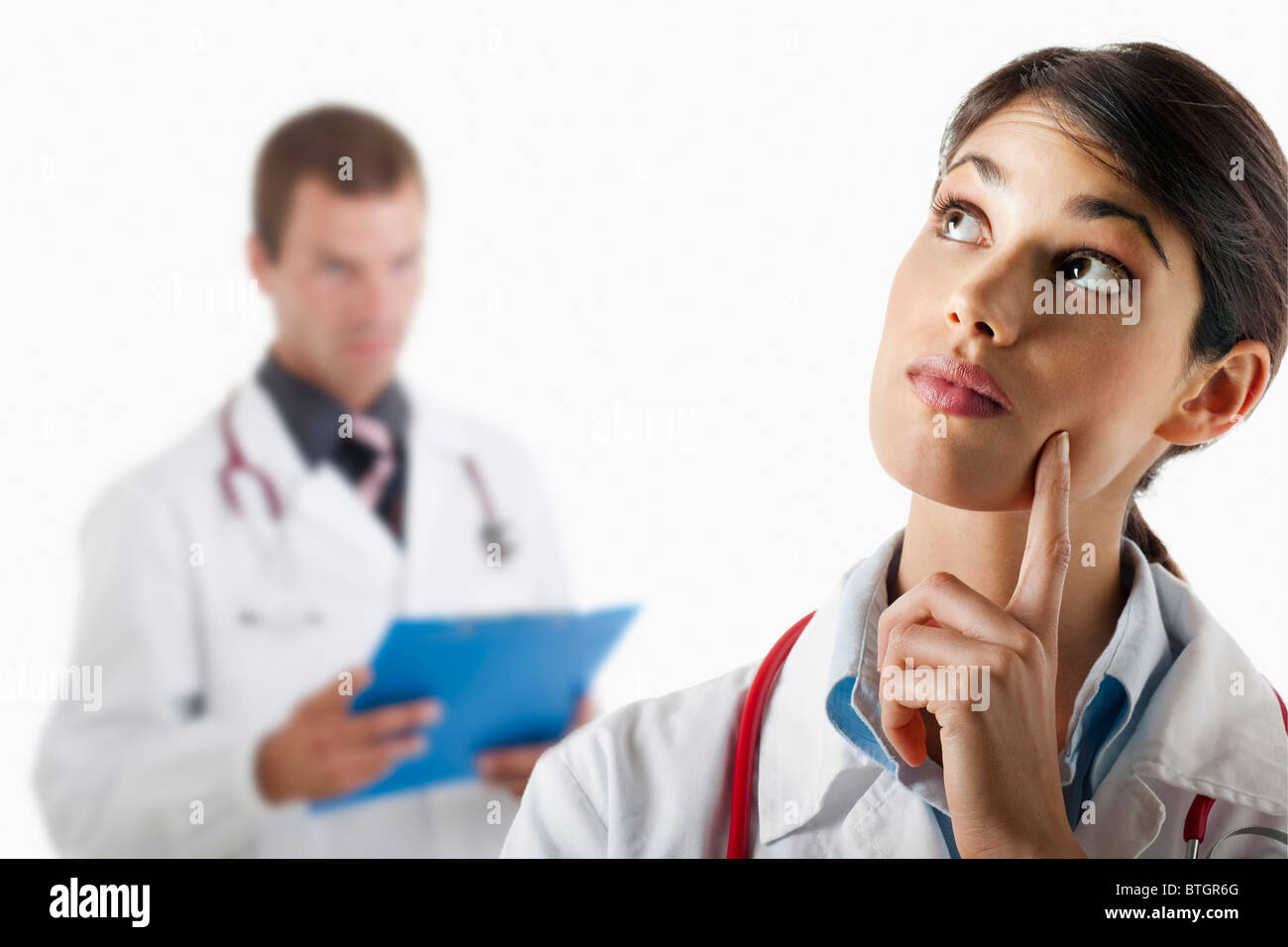 Doctor questioning and doctor with medical chart Stock Photo - Alamy