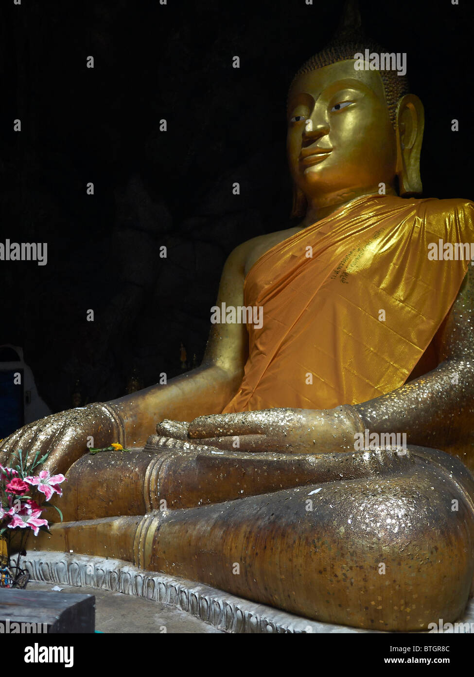 Large golden Buddha at Khao Luang underground cave temple Petchaburi ...