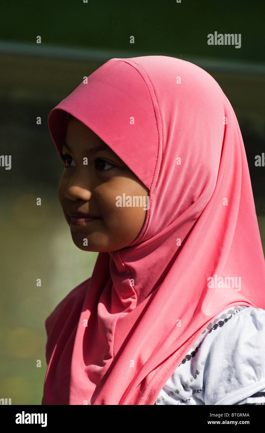 Smiling young Malaysian girl at Zoo Negara in Kyala Lumpur Stock Photo ...