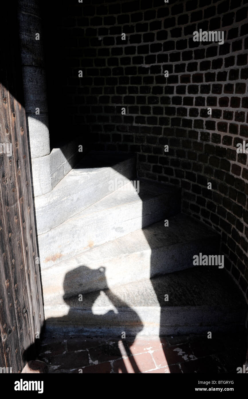 Shadow of Photographer on curved stone staircase at Fort Pulaski ...
