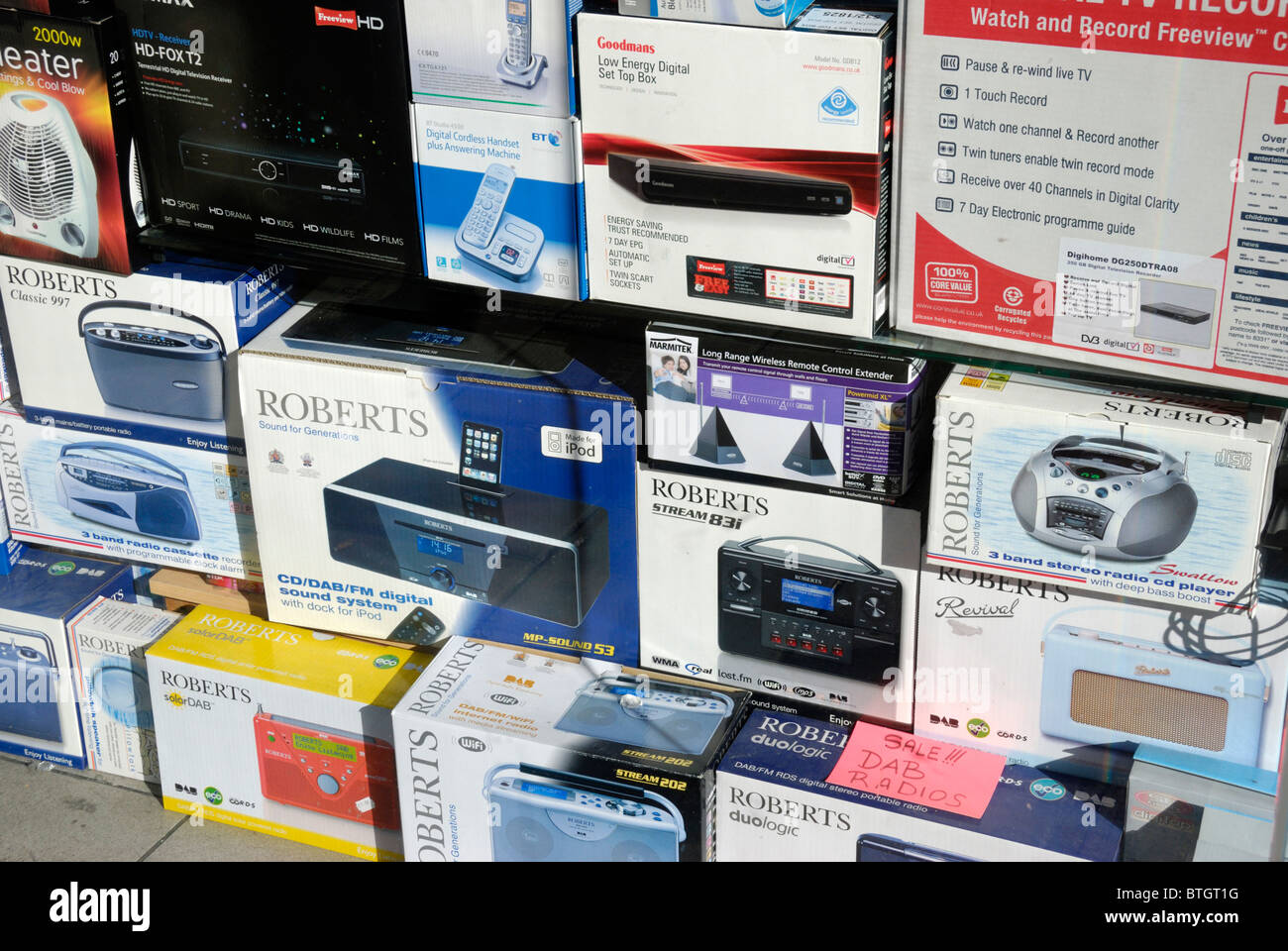 A window display of boxed electrical products Stock Photo - Alamy
