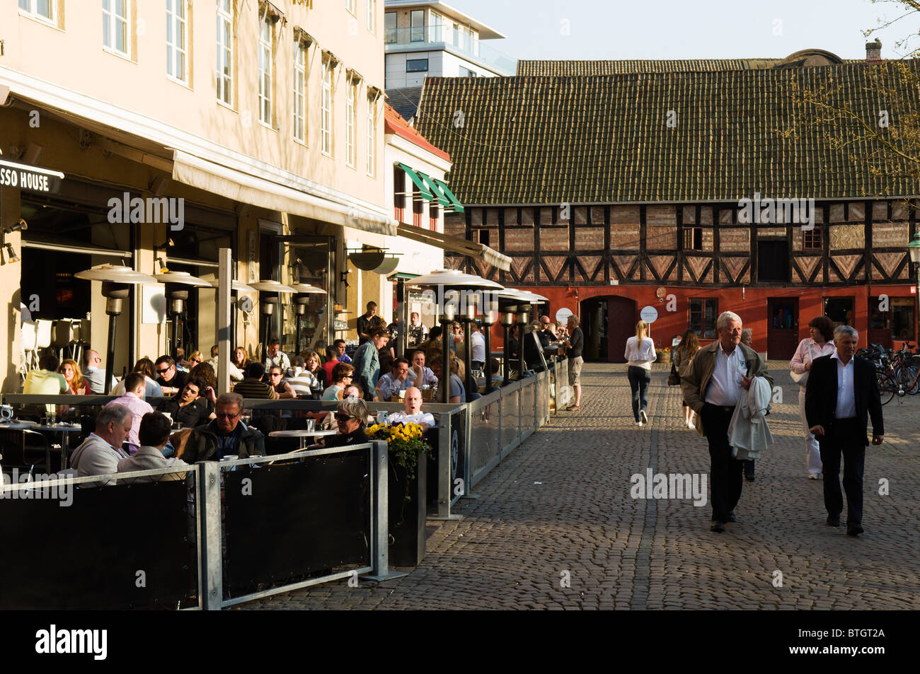 People enjoying a spring afternoon at Lilla Torg historical square in ...