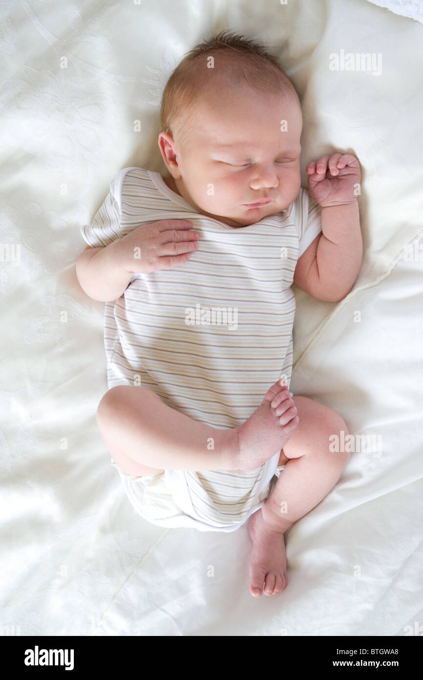 Her sleeping baby hi-res stock photography and images - Alamy