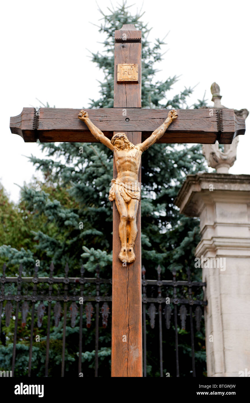 The crucifixion from a tree with Jesus's gilt figure Stock Photo - Alamy
