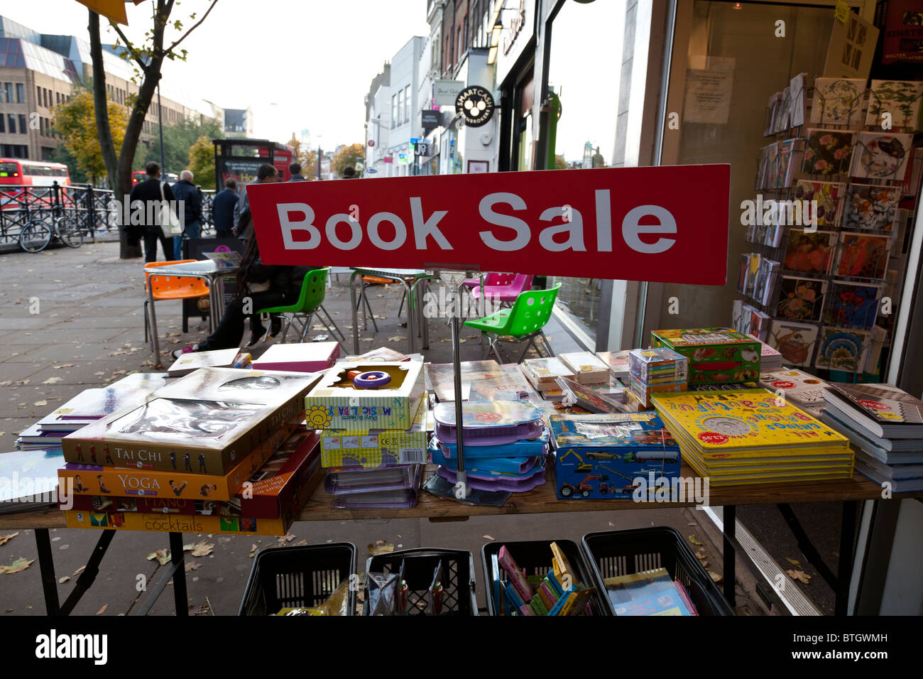 A pavement stall outside a shop offering books and games for sale ...