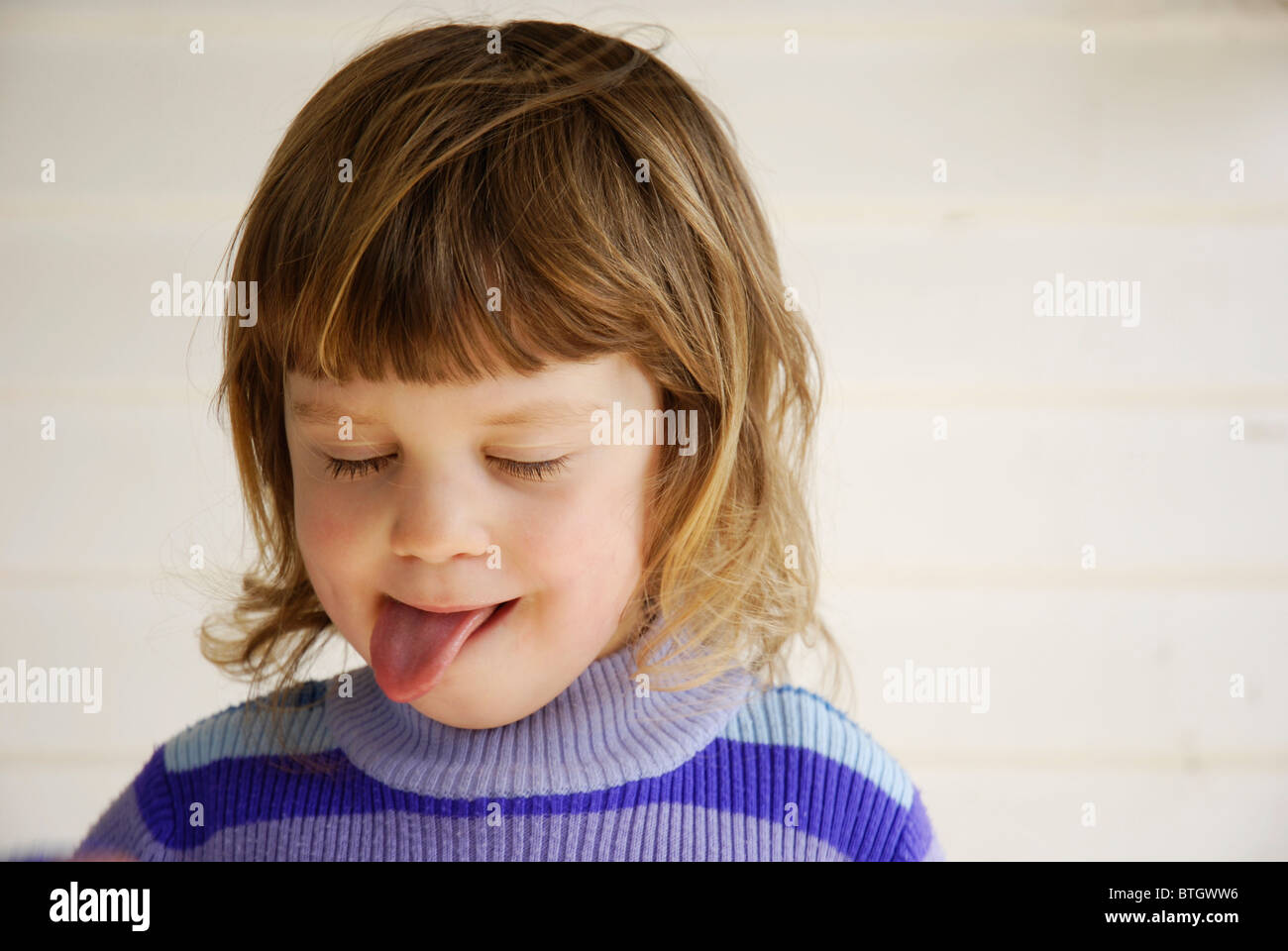 Casual Portrait Of A Young Three Year Old Girl With Cropped Fringe