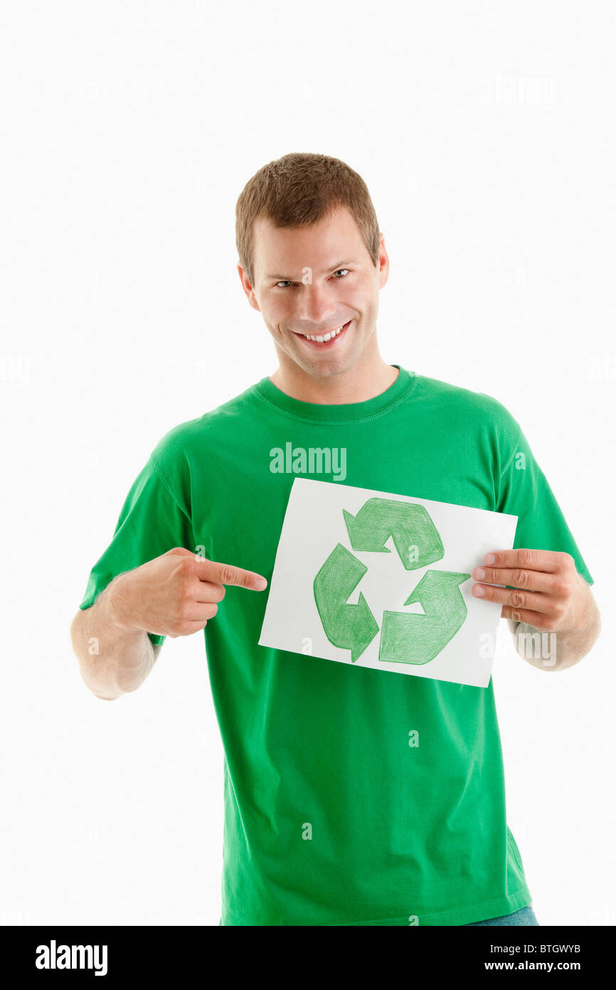 Man holding recycling symbol drawing Stock Photo - Alamy