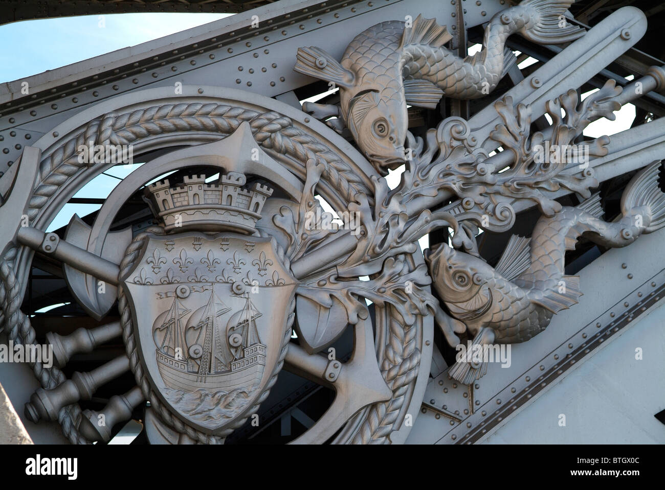 Metal bridge with Paris coat of arms over La Seine river in Paris ...