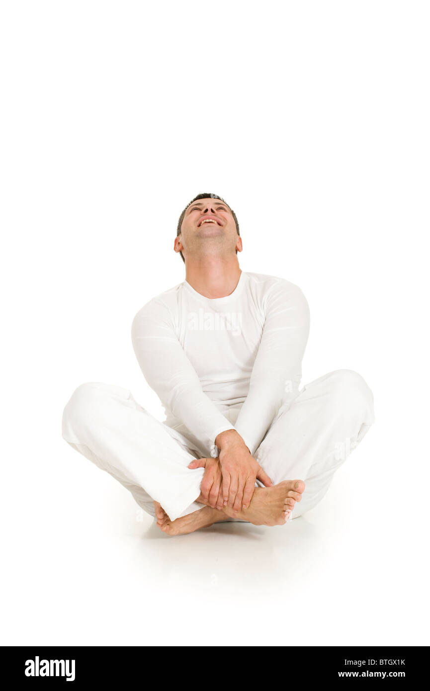 Man crossed legs sitting Cut Out Stock Images & Pictures - Alamy