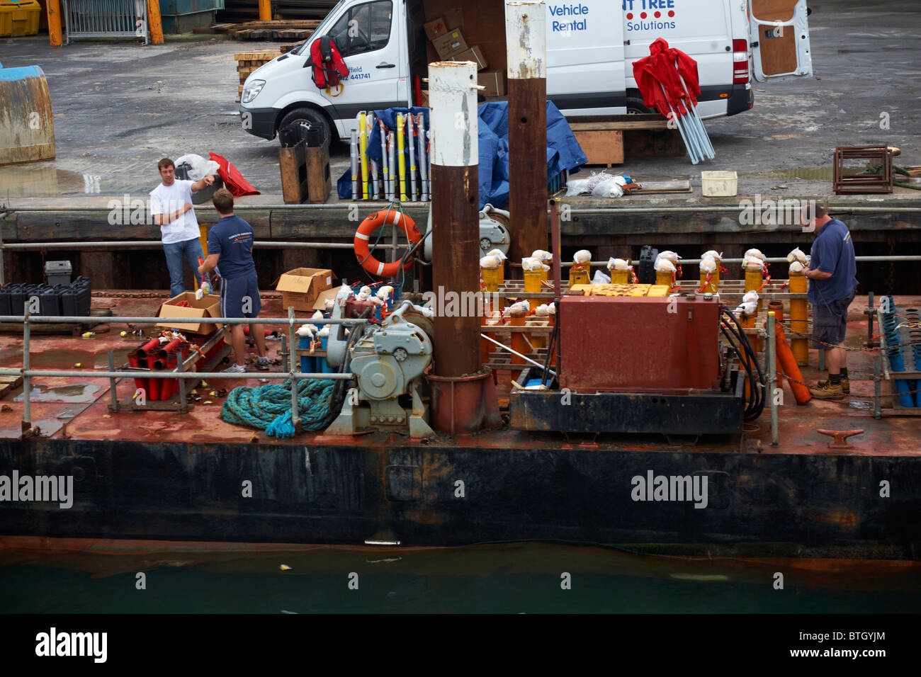 Preparing the fireworks on the platform in Poole Harbour ready for the ...