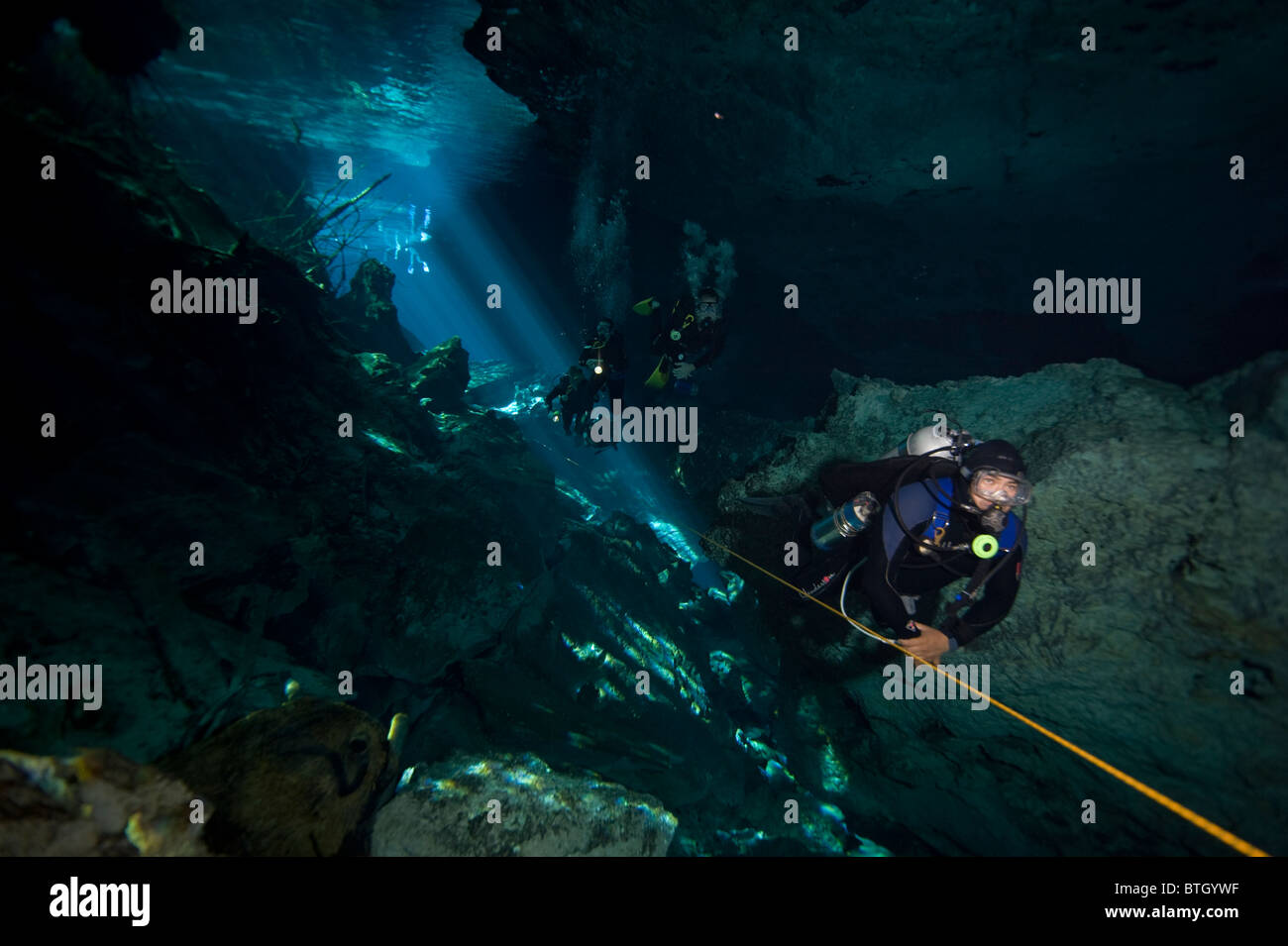 Cave diving in the Cenote cave system in Mexico's Yucatan Peninsula ...