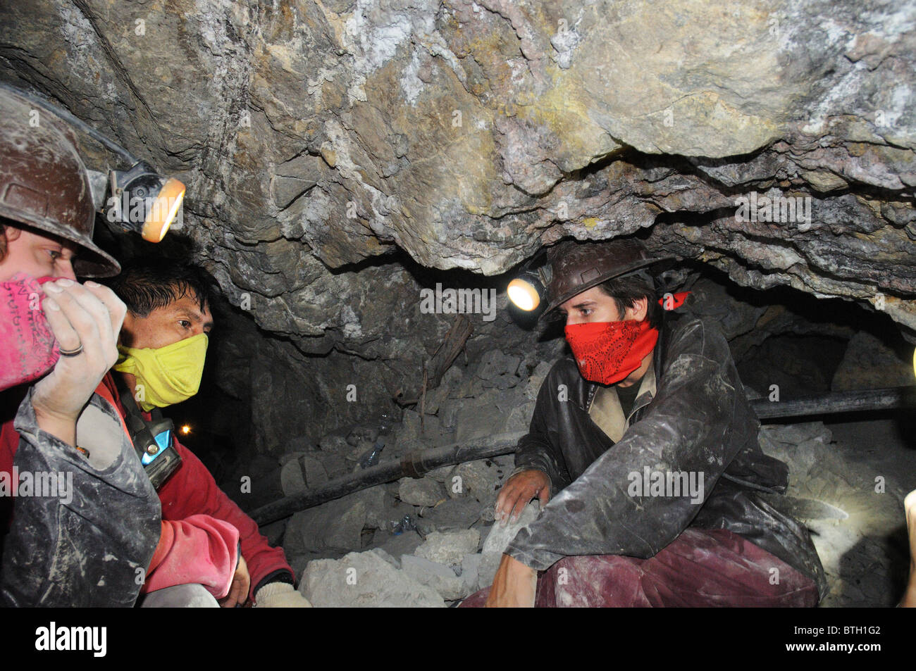 Tourists in the awesome silver mines of Potosi in Bolivia Stock Photo ...